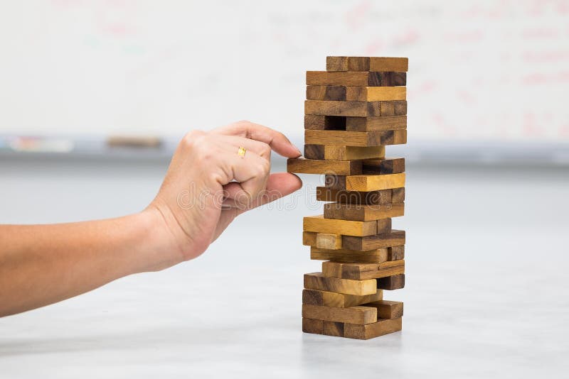 Closeup of Hand Playing Wood Blocks Stack Game Stock Photo - Image of ...