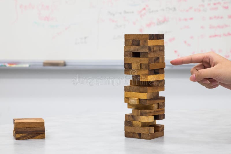Closeup of Hand Playing Wood Blocks Stack Game Stock Photo - Image of ...