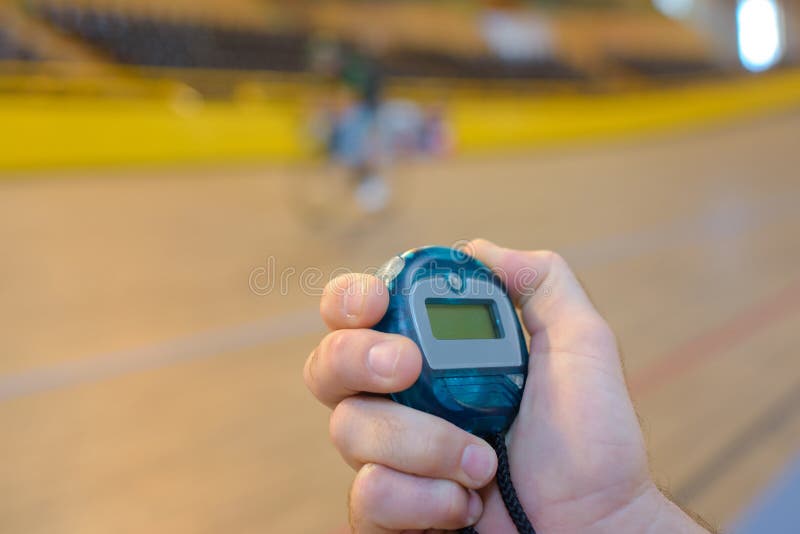 Closeup hand on stopwatch stock image. Image of timer - 83781639