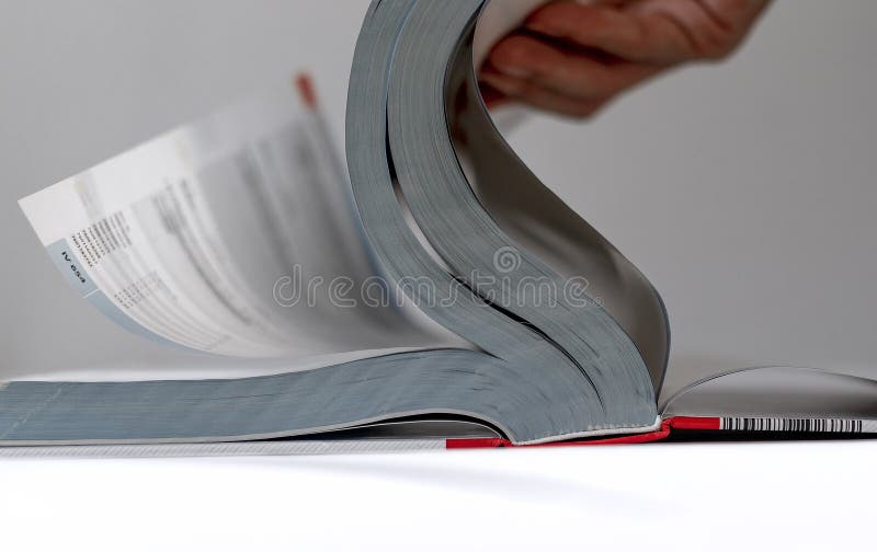 Closeup Hand Turning Pages of Technical Book, Reading and Studying ...