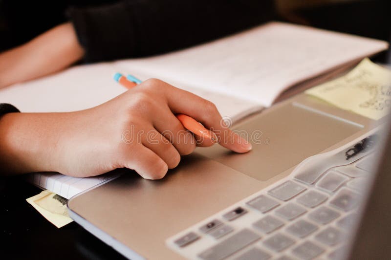 Closeup Hand Using Computer LapTop To Study and Learn School Work NYC ...