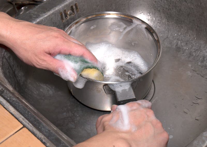 Closeup Hand Washing Pot stock image. Image of plate - 88181053