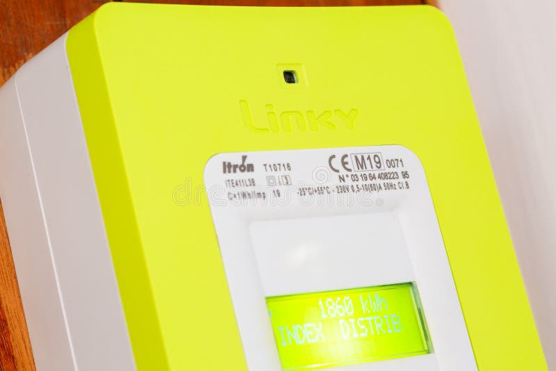 Closeup of Hand of Woman on New Smart Electric Meter Linky from ERDF ... Closeup of Hand of Woman on New Smart Electric Meter Linky from ERDF ...