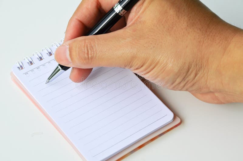 Closeup hand writing notes stock image. Image of pile - 34754327