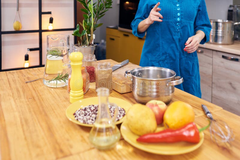 Closeup of Hands of Chef Cook Pouring Red Lentils into a Pot Stock ...