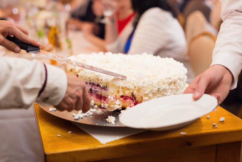 Cutting a cake stock image. Image of decoration, celebration - 123455413