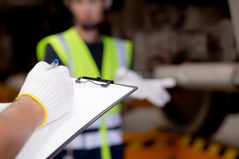 Closeup Hands Engineer Man and Woman or Worker Checking Electric Train ...