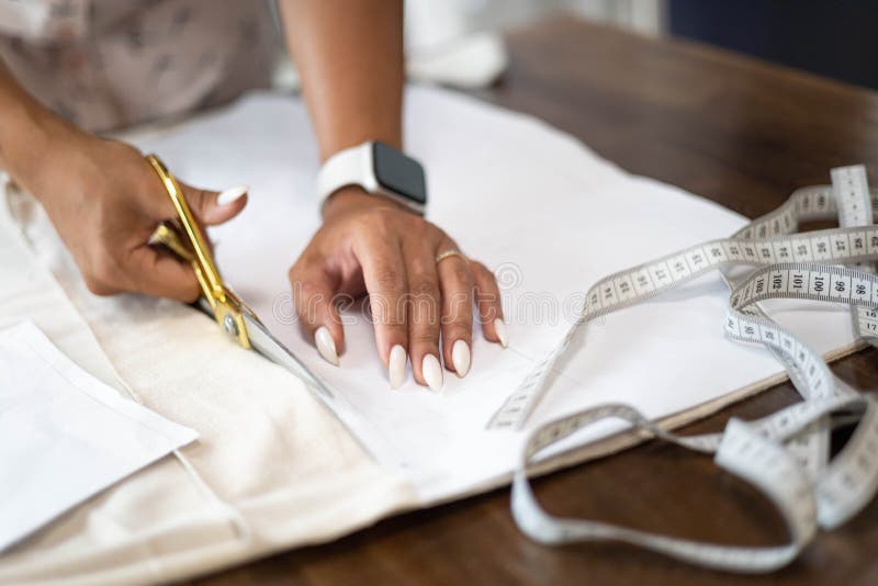 Closeup Hands of Female Professional Seamstress Cutting Textile Use ...