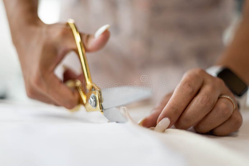 Closeup Hands of Female Professional Seamstress Cutting Textile Use ...
