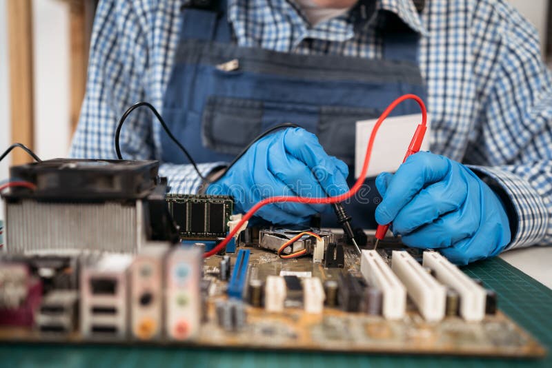 Closeup Hands of Female Technician Measuring Electrical Voltage of ...
