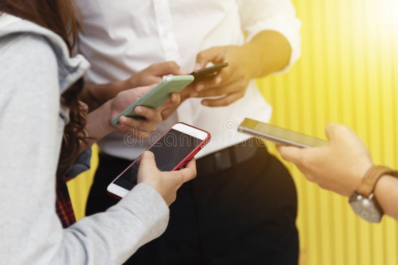 Closeup of Hands Holding Mobile or Smartphone. Modern Connection ...