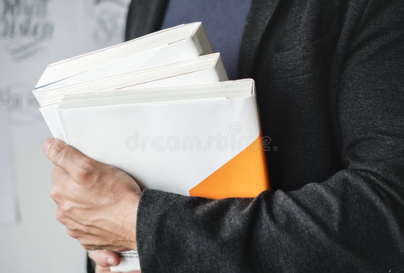 Closeup of Hands Holding Stack of Books Stock Image - Image of carry ...