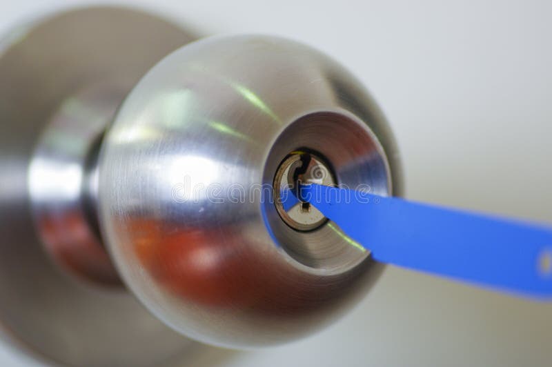 Closeup Hands of Locksmith Using Pick Tools To Open Locked Door Stock ...