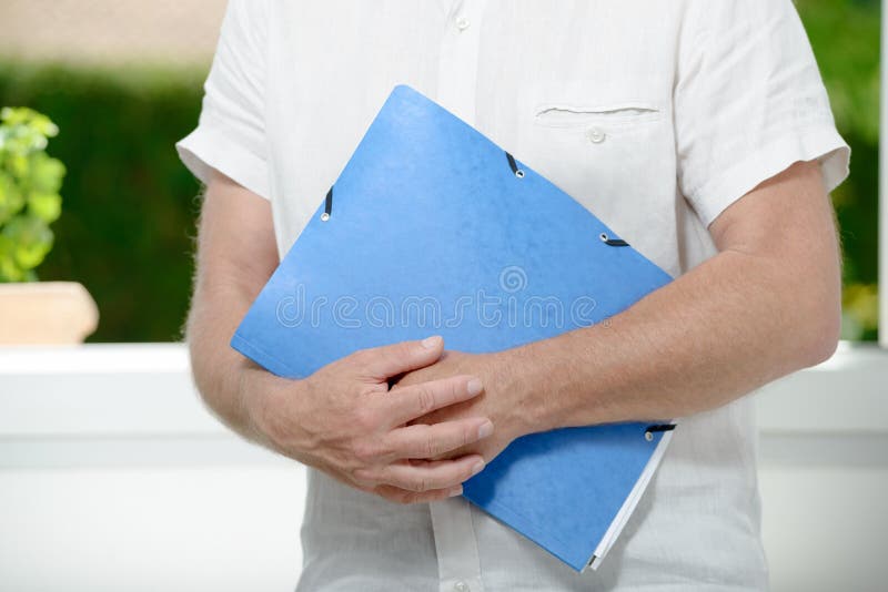 Closeup of Hands of a Man with a Folder Stock Image - Image of ...