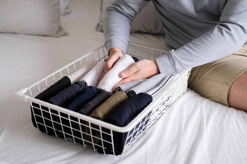 Closeup of Hands of an Man Tidy Up Things in Mesh Storage Containers ...