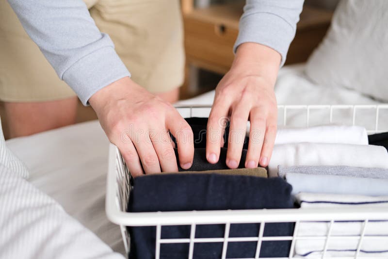 Closeup of Hands of an Man Tidy Up Things in Mesh Storage Containers ...