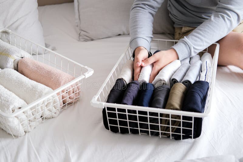 Closeup of Hands of an Man Tidy Up Things in Mesh Storage Containers ...