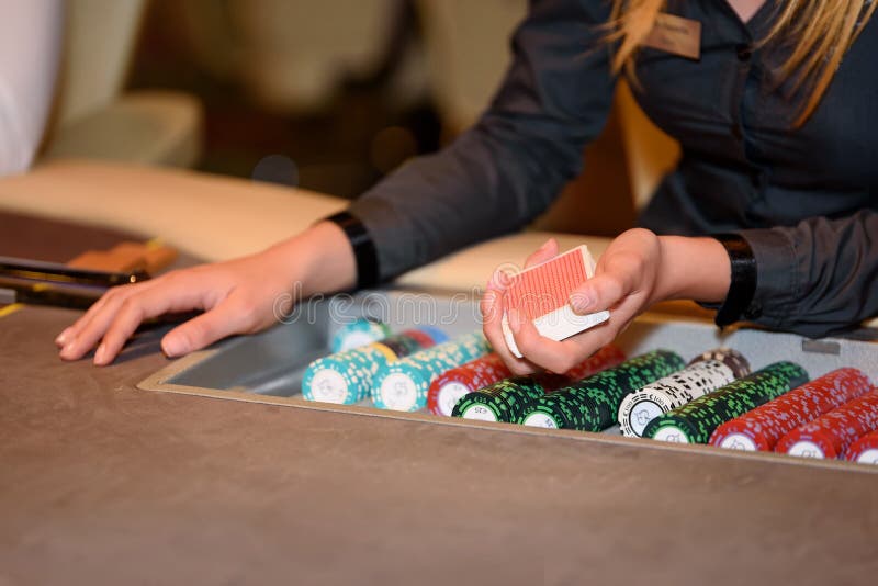 Closeup of Hands of Poker Dealer with Chips in Casino, Selective Stock ...