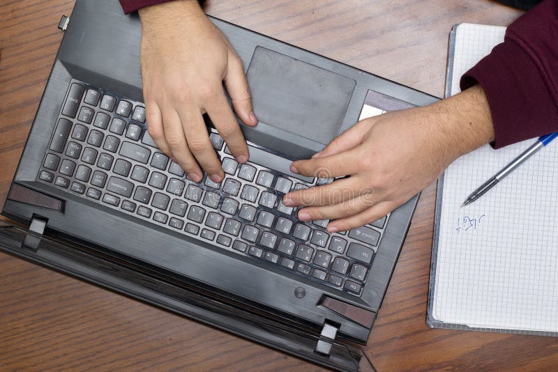 Closeup on Hands Typing on Keyboard, Notebook and Pen Stock Photo ...