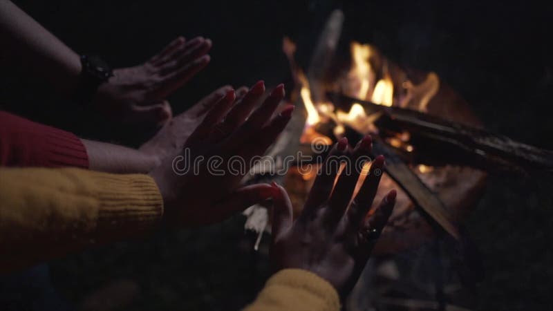 Closeup of Hands Warming by the Camping Fire Stock Video - Video of ...
