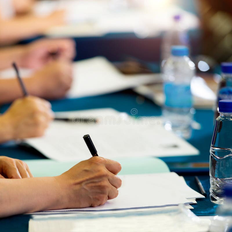 Hands writing on paper stock photo. Image of learned - 292636090