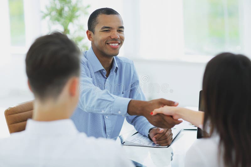 Closeup.handshake Manager and the Client in the Office Stock Photo ...