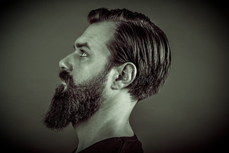 Closeup of a Handsome Young Man with Retro Look, Side View. Stock Photo ...