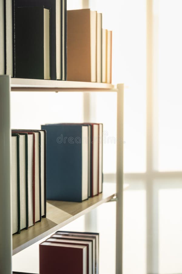 Closeup of Hard Cover Books on Shelf Stock Photo - Image of room ...