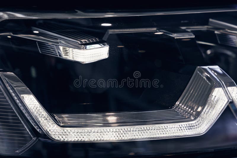 Closeup Headlights of a Modern Car. Detail on the Front Light of a Car ...