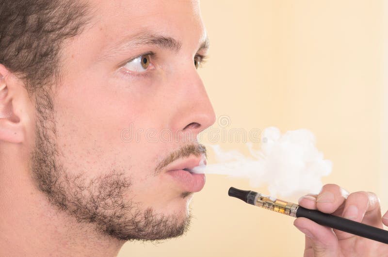 Closeup Headshot of Man Smoking on Electronic Stock Photo - Image of ...