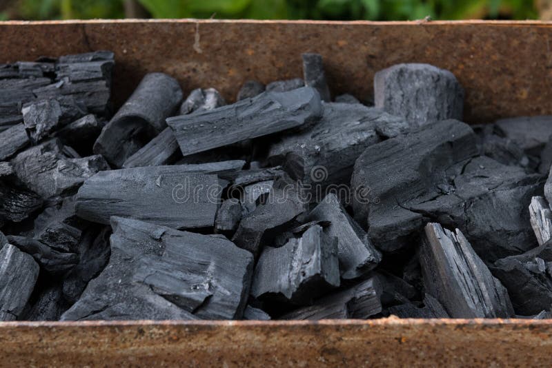 Closeup of a heap of coals stock photo. Image of bonfire - 125598434