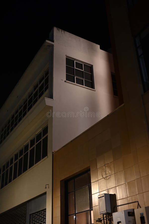 Closeup of a High Rise Building at Night Stock Photo - Image of night ...