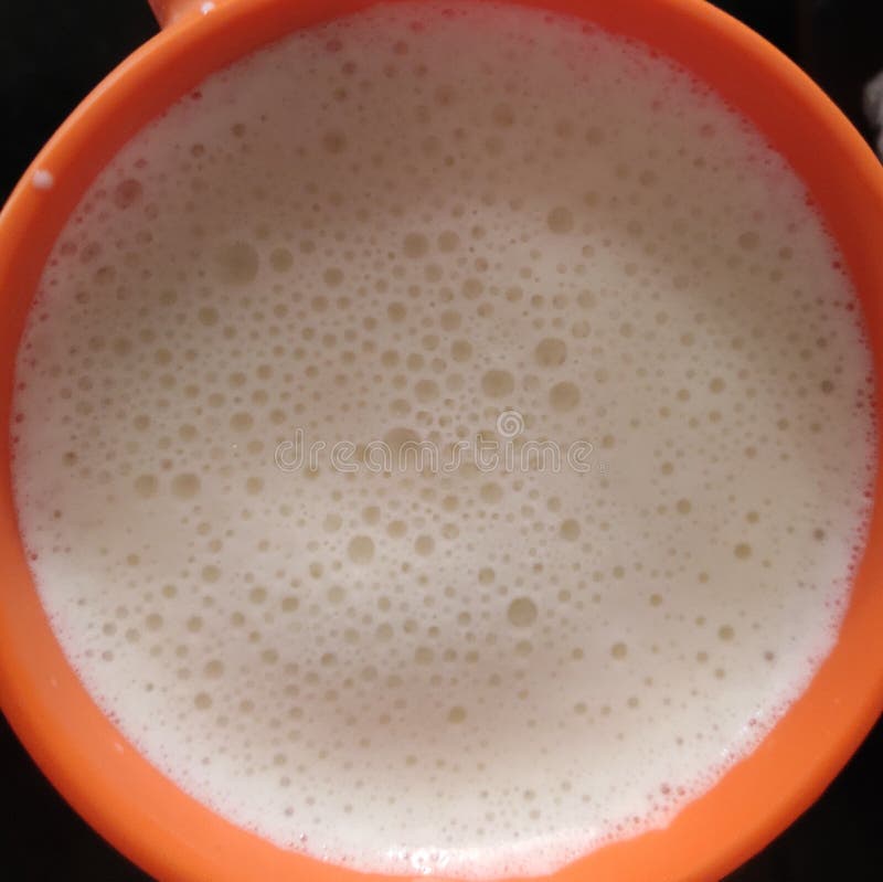 Closeup of Hot Milk in Orange Cup Stock Photo - Image of tableware ...