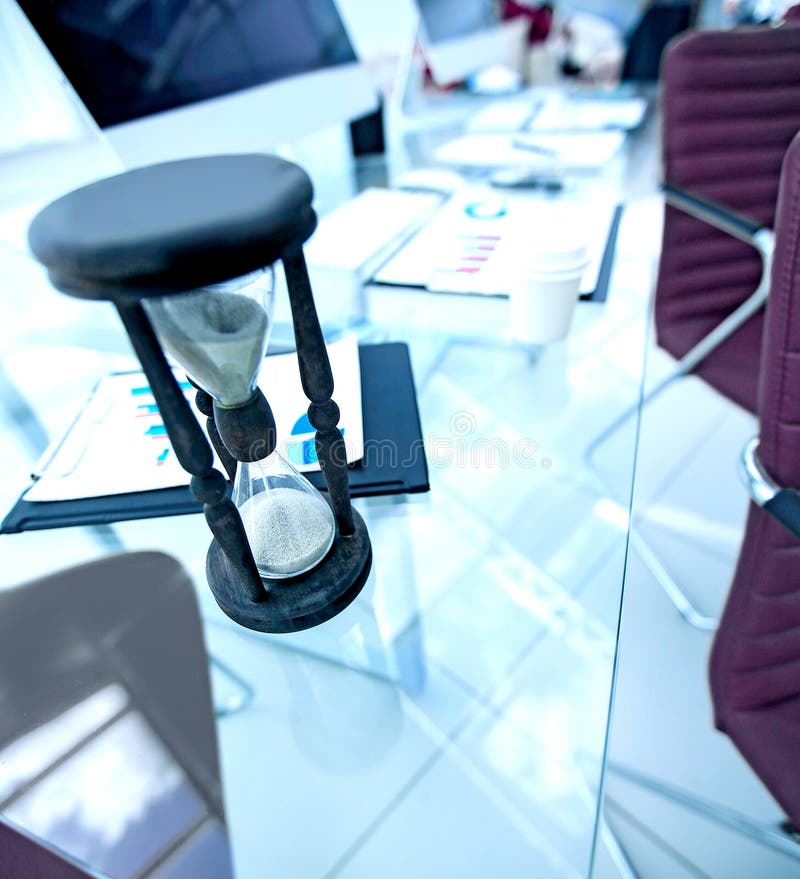 Closeup.the Hourglass on the Desk of a Businessman Stock Image - Image ...