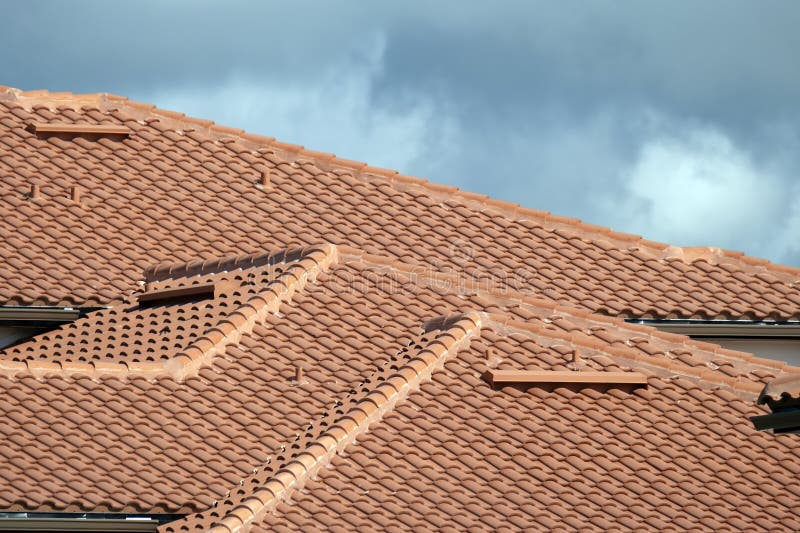 Closeup of House Rooftop Covered with Ceramic Shingles. Tiled Covering ...