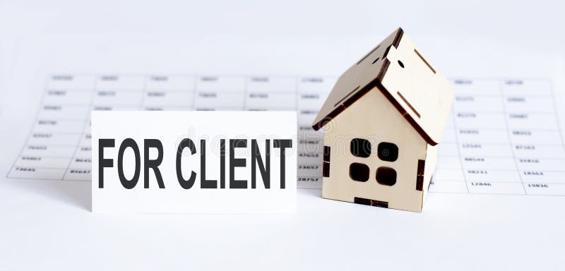 Closeup of House Wooden Model with Blank for Text for CLIENT on Chart ...