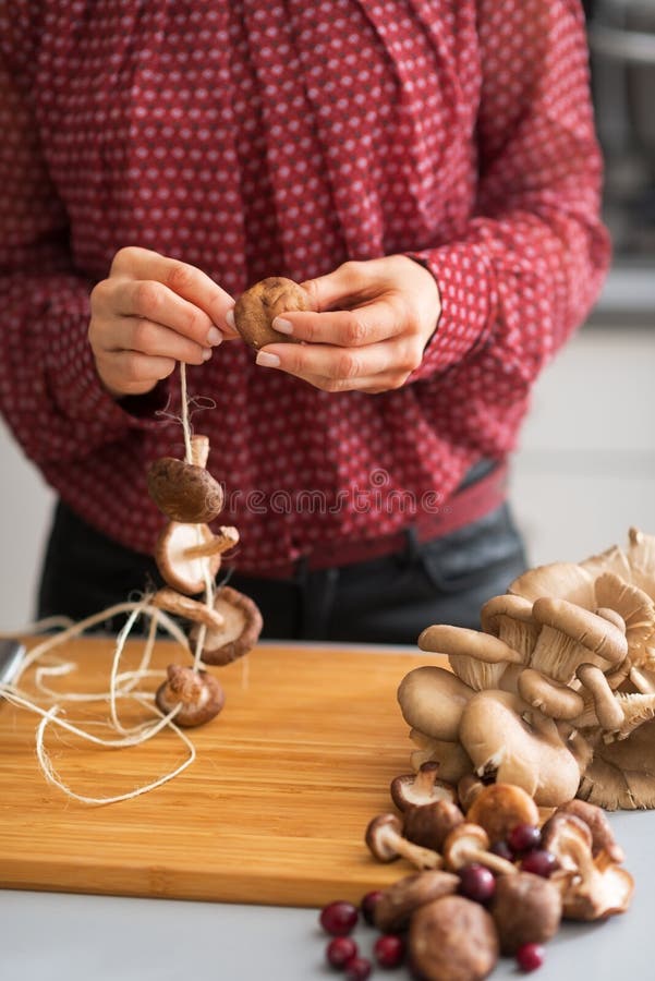 Closeup on Housewife Stringing Mushrooms on String Stock Image - Image ...