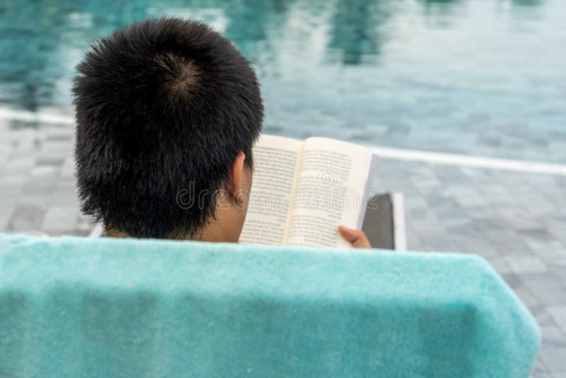 Closeup of Human Reading Book at Swimming Pool Stock Image - Image of ...