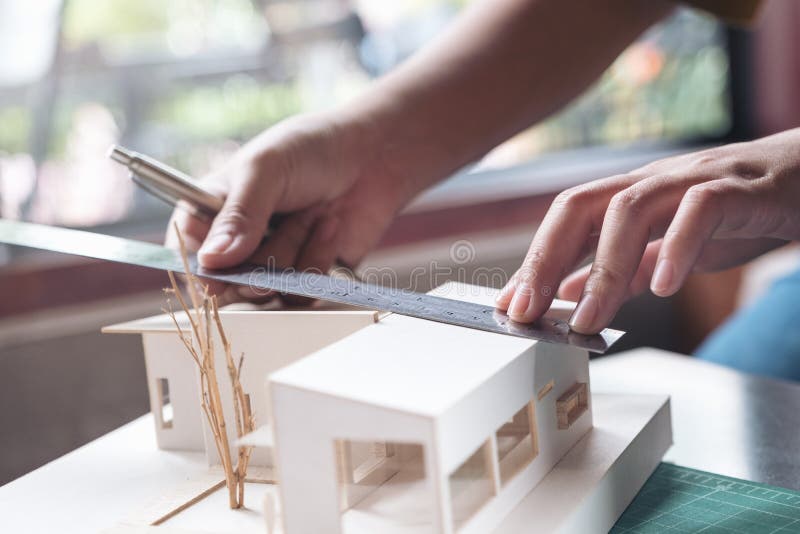 Closeup Image of an Architect Measure Scale of a Mass Model on Table ...