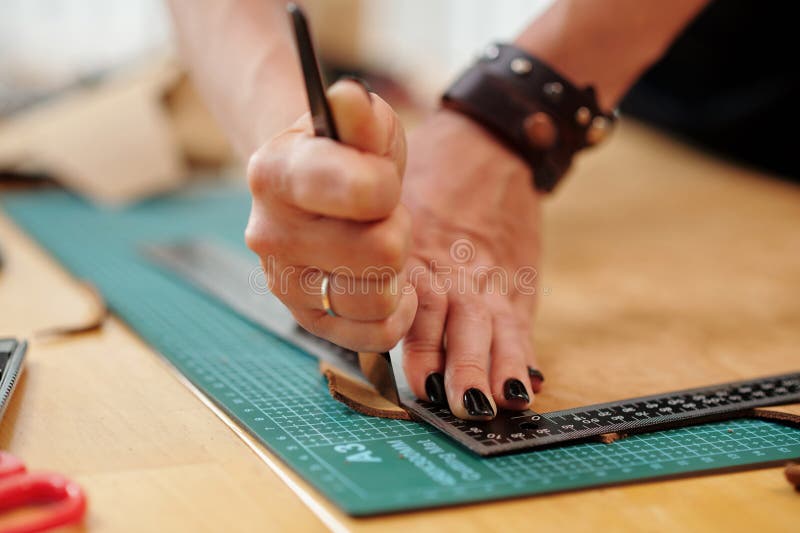 Craftsperson Cutting Leather Piece Stock Photo - Image of woman ...