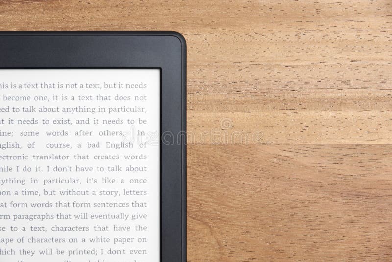Closeup Image of an Electronic Reader with Text on the Screen on a ...