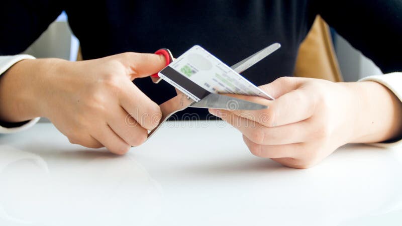 Closeup Image of Female Bank Worker Cutting Plastic Credit Card Stock ...