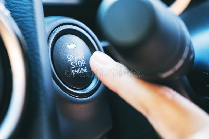 A Finger Pressing on a Start Stop Engine Button in a Car Stock Image ...