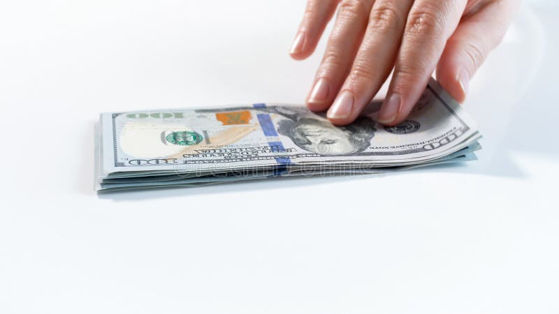 Closeup Image of Hand Taking Dollar Banknote from Stack of Money on ...
