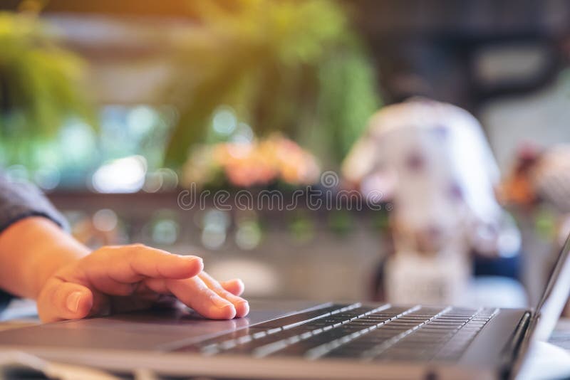 Hand Using and Touching on Laptop Touchpad on Wooden Table Stock Photo ...