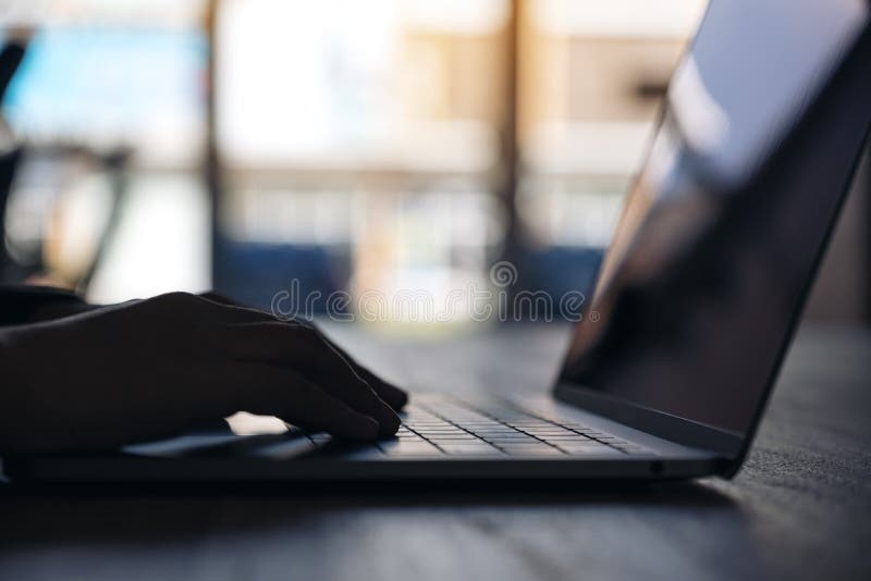 Hand Using and Typing on Laptop Keyboard in Cafe Stock Photo - Image of ...