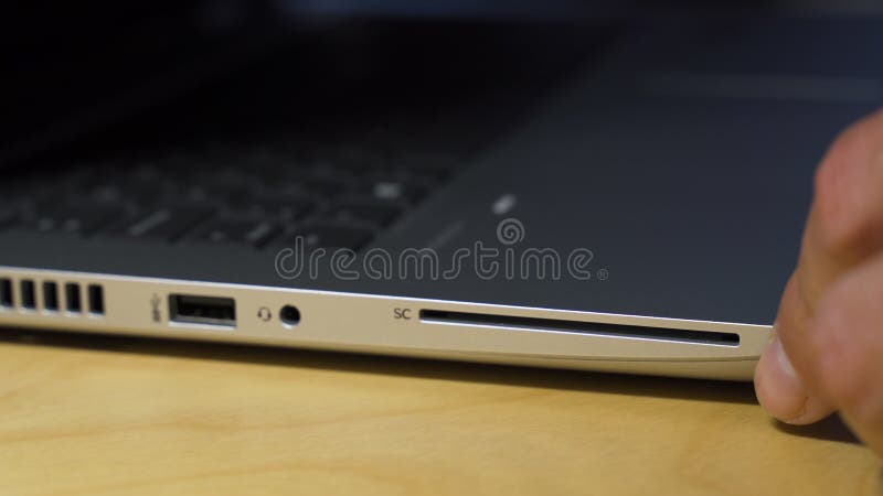 Closeup Image of a Man Opening a Laptop Computer on a Table Stock ...
