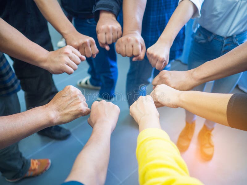 Closeup Image of Many People Putting Their Fists Together As Symbol of ...