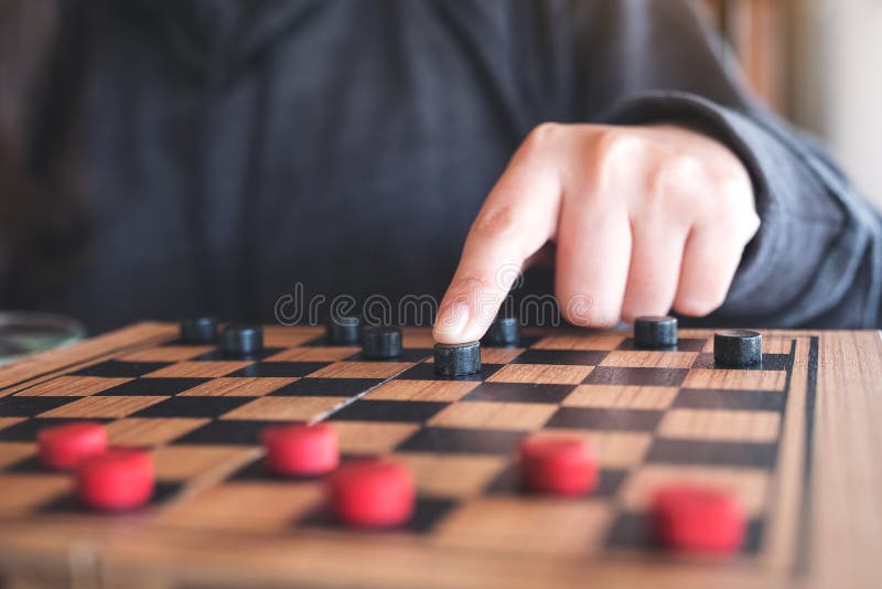 People Playing and Moving Checkers in a Chessboard Stock Image - Image ...