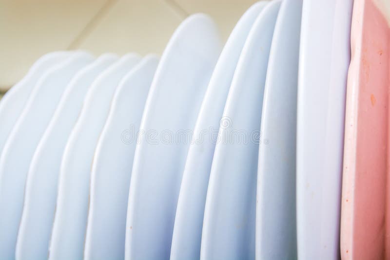 Close Up Pile of White Plates Stacked Horizontally Stock Photo - Image ...